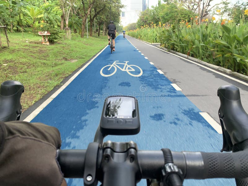 Cyclist Point View while Biking in a Separated Bicycle Lane Stock Image ...