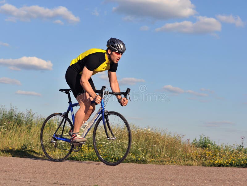 Cyclist Riding a Bike Uphill Stock Image - Image of racer, movement ...