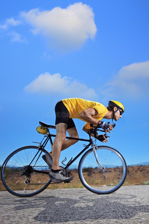 Cyclist Riding a Bike Uphill Stock Image - Image of racer, movement ...