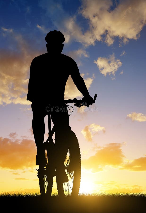 Cyclist Riding a Mountain Bike Stock Image - Image of twilight, evening ...