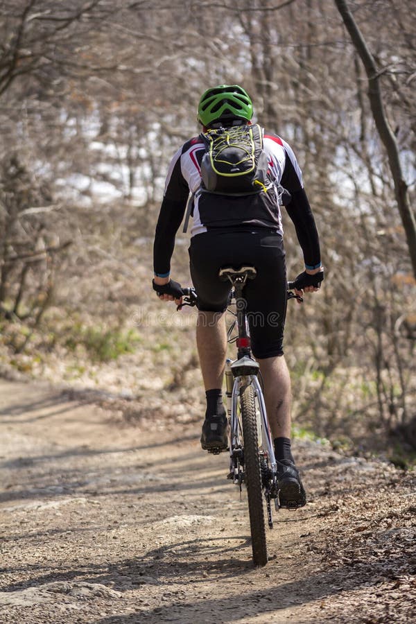 Cyclist Riding Mountain Bike Stock Photo - Image of adult, outside ...