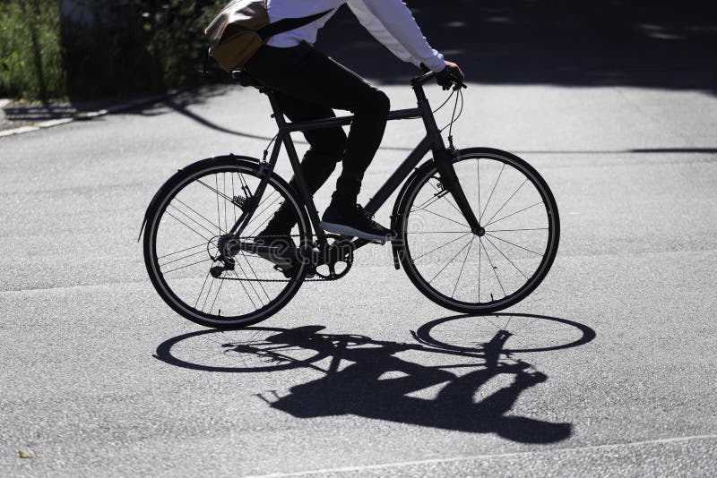 Cyclist_shadow stock image. Image of male, cast, fast - 196582565