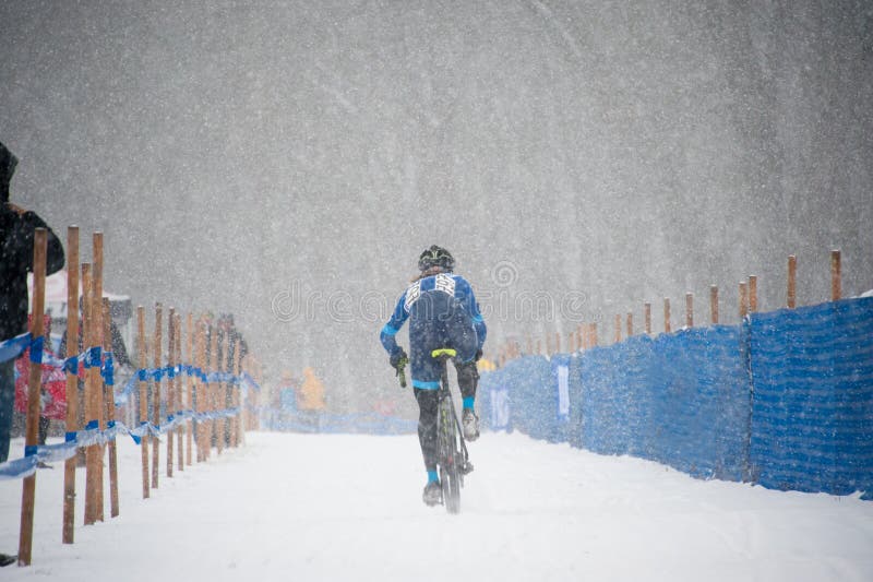 Cyclist in Snow stock photo. Image of snow, cyclocross - 83897152