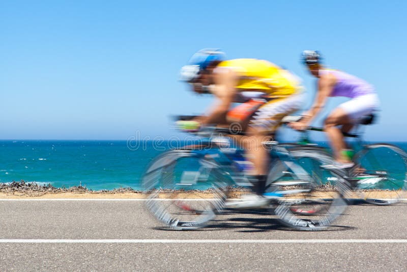 Cyclists Competition Along a Coastal Road Stock Image - Image of ...