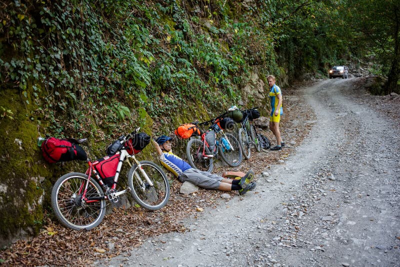 Cyclists Rest in the Mountains while Biking Stock Image - Image of male ...