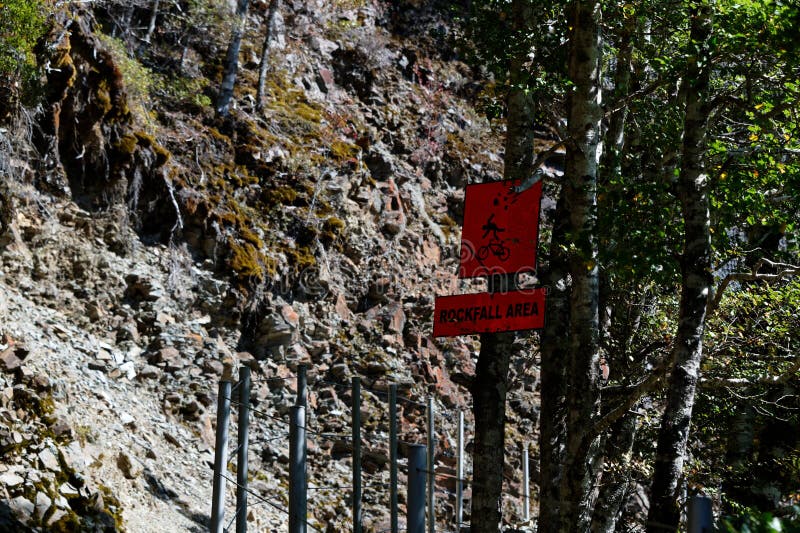 Cyclists Take Care, Rockfall Area Stock Photo - Image of hazard ...