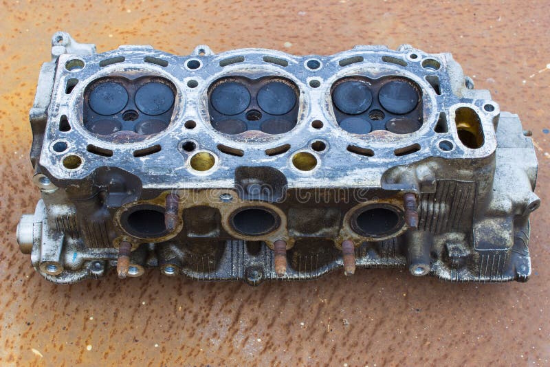 Cylinder head on rusty stock image. Image of cams, industrial - 92549865