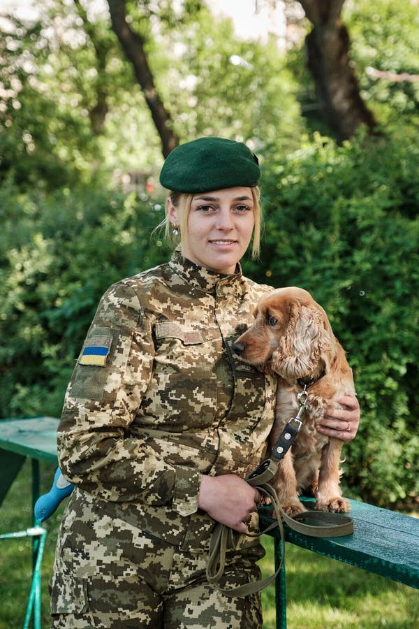 Cynologist with a Dog. Service Dog Breed English Cocker Spaniel Dog ...