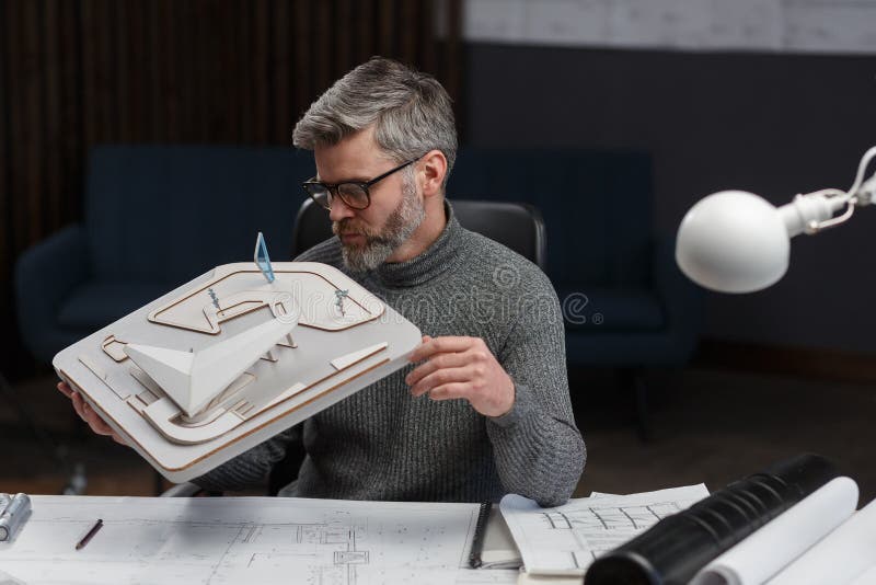 3d Architect Working in Office with Building 3D Model. Engineer Inspect ...