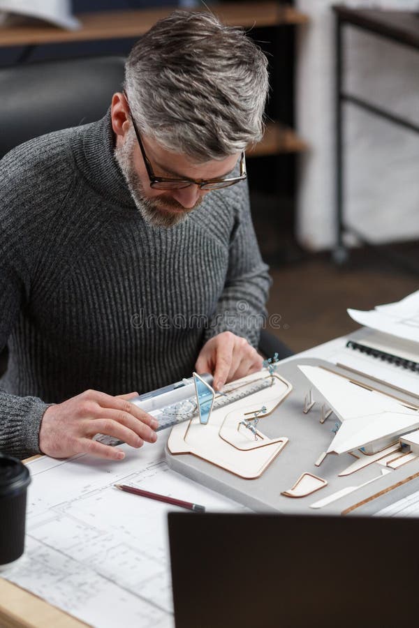 3d Architect Working in Office with Building 3D Model. Engineer Inspect ...