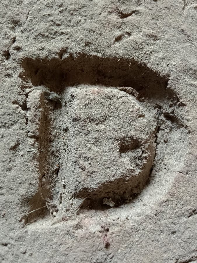 D latter on clay brick stock photo. Image of font, brickwork - 309587142