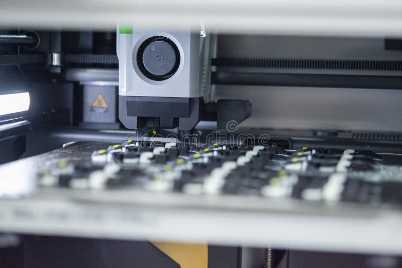 3D Printer Close Up Working 3D Printer in Process of Printing Object ...