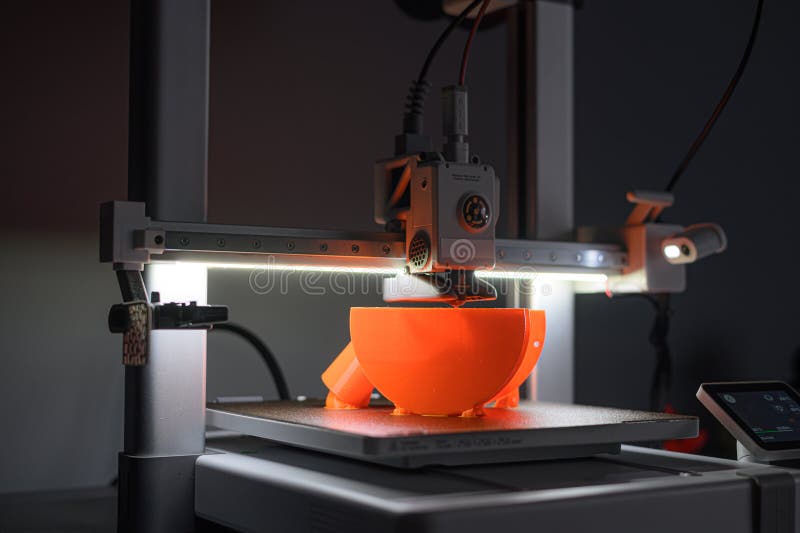 3D Printer Creating Detailed Orange Model on Platform Stock Image ...