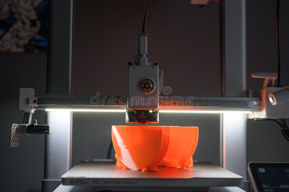 3D Printer Creating Detailed Orange Model on Platform Stock Photo ...