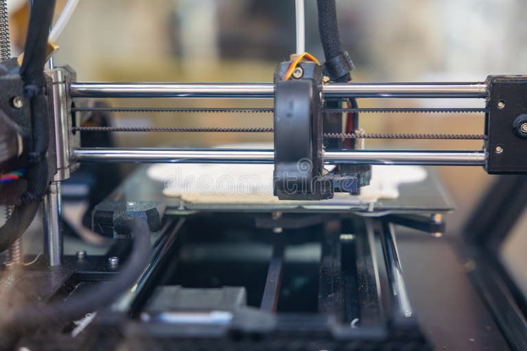 3D Printer Creating Plastic Objects with Precision and Speed. the ...