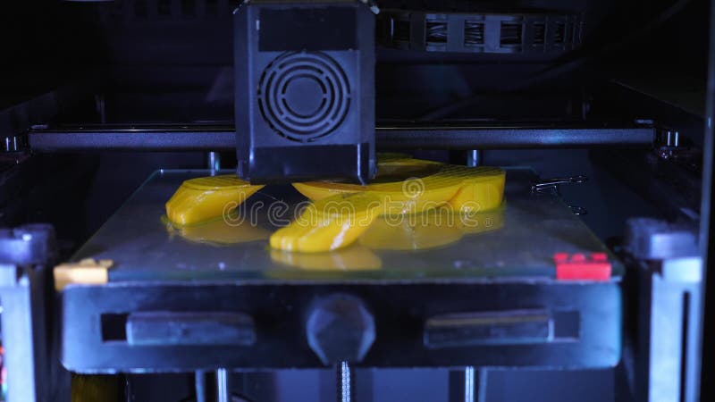 A 3D Printer Machine that Creates a Three-dimensional Geometric Shape ...