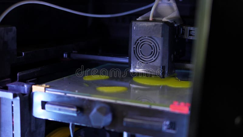 A 3D Printer Machine that Creates a Three-dimensional Geometric Shape ...