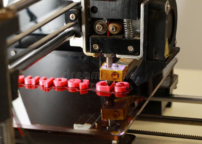 3D Printer Printing Words with Red Plastic Stock Photo - Image of ...
