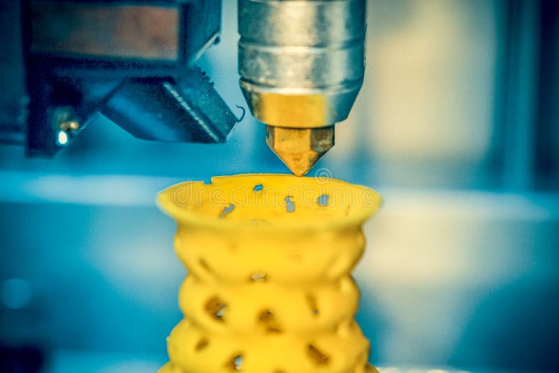 3d Printer Printing Objects Yellow Form Closeup. Stock Image - Image of ...