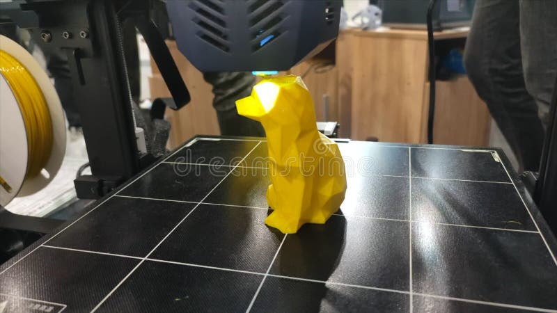 3D Printer Working Close-up 3D Printer Prints Model from Molten Yellow ...