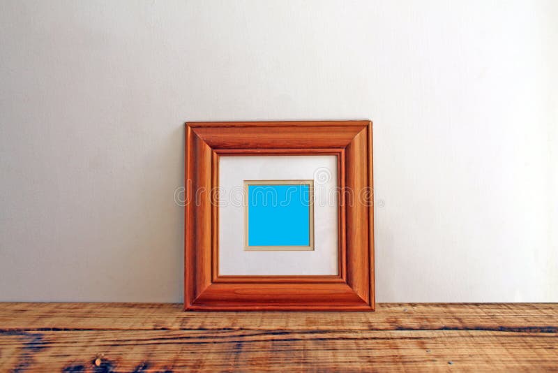 3d Render of a Blank Frame on a Wooden Surface Stock Illustration ...