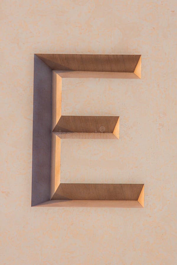 3D Rendering of the Capital Letter E with a Wooden Texture Isolated on ...