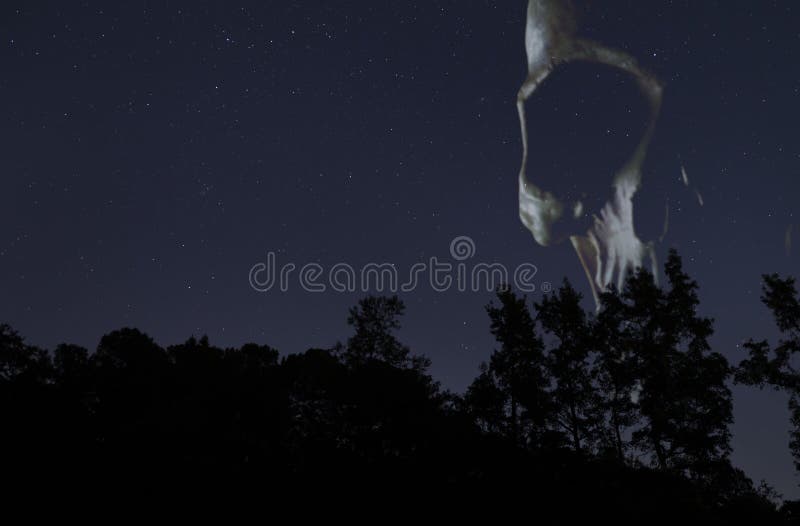 3D Rendering of a Ghost Rising on a Starry Night Stock Illustration ...