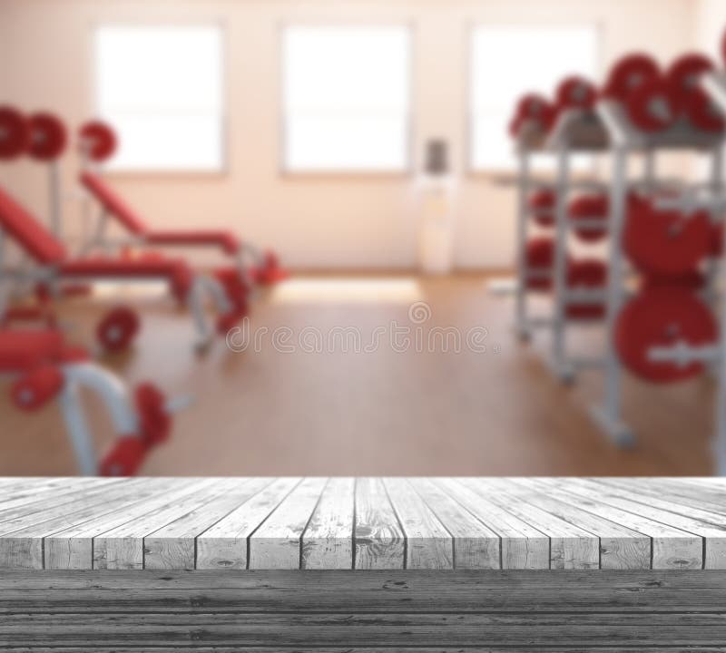 3D White Wooden Table Looking Out To a Defocussed Gym Interior Stock ...