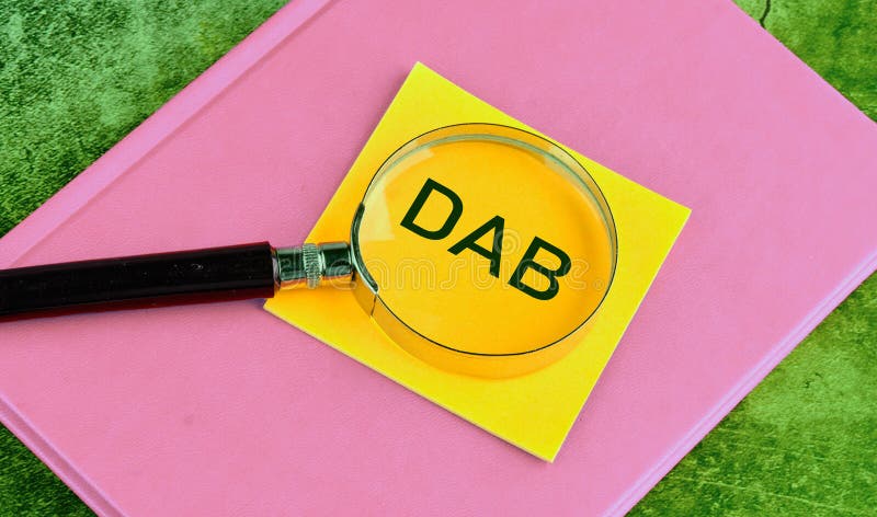 DAB Written through a Magnifying Glass on a Yellow Sticker, a Concept ...