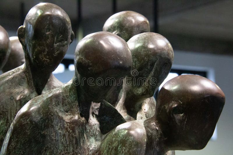 DACHAU, GERMANY - NOVEMBER 25, 2017: Group of Abstract Bronze Human ...