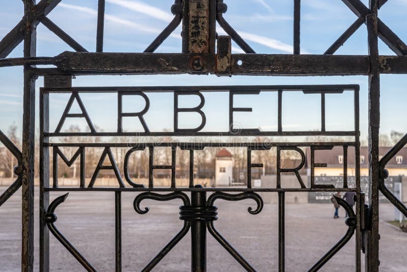 DACHAU, GERMANY Work Sets You Free Sign on Gates at Dachau ...