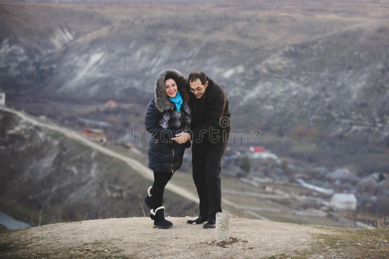 Dacing Couple in Cold Wind stock image. Image of beautiful - 66356409