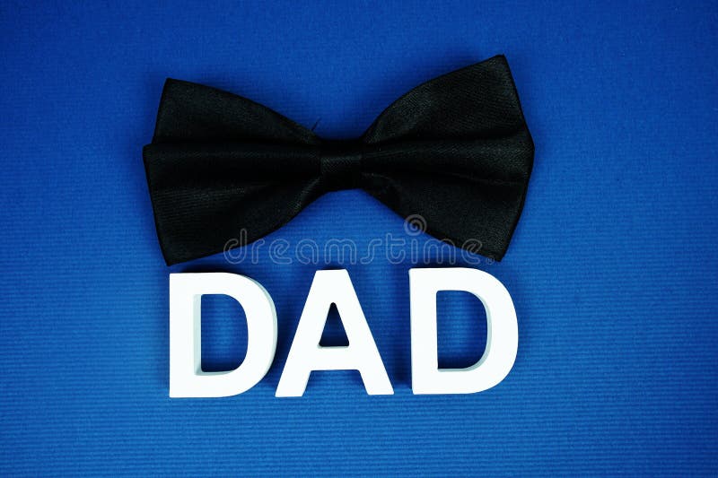 DAD Alphabet Letters with Bow Tie on Navy Blue Background Stock Photo ...