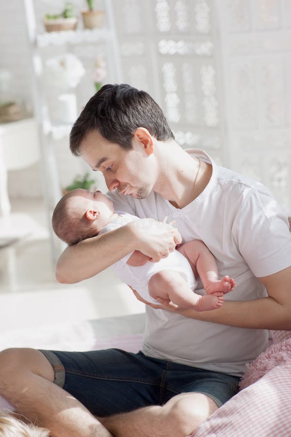 Dad and baby stock image. Image of infant, parents, lifestyle - 70684841