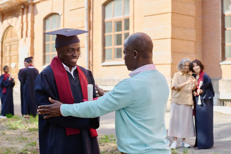 Dad Congratulating His Son with Graduation Stock Photo - Image of ...