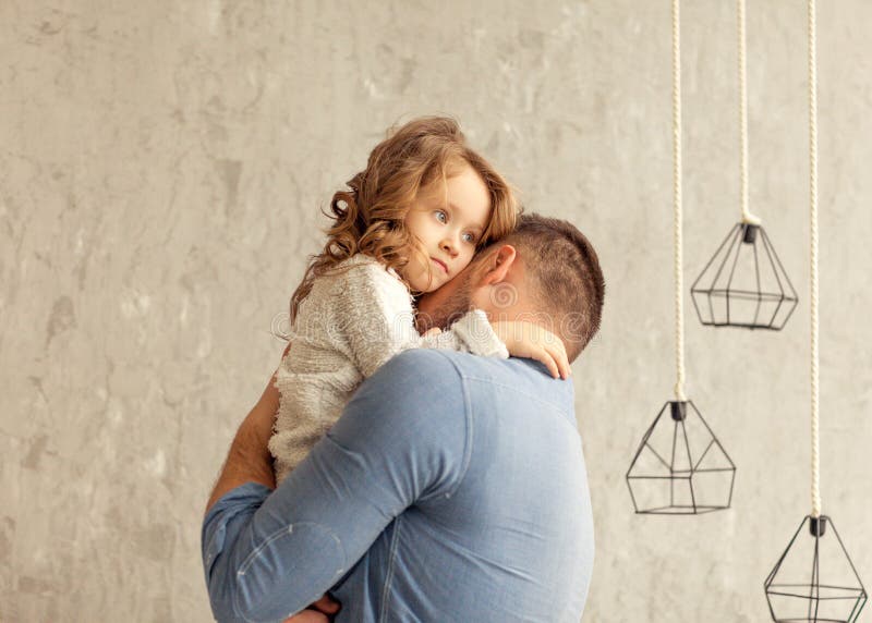 Dad and Daughter are Hugging at Home Stock Photo - Image of cute ...