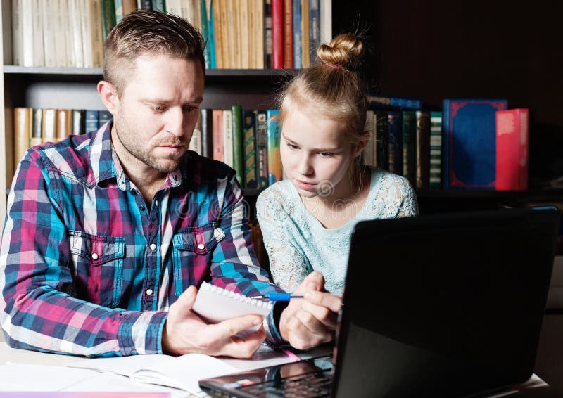 Dad and Daughter Learning Together on a Laptop. Stock Image - Image of ...