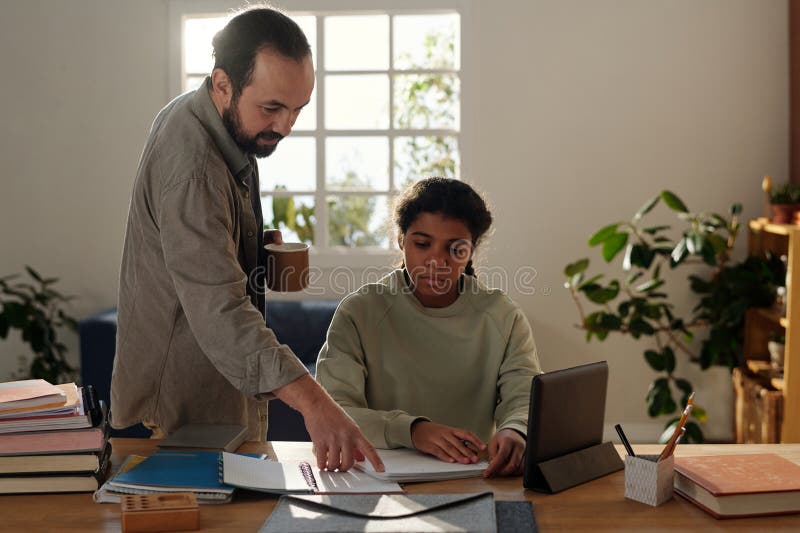 Dad Helping His Adopted Child with Her Study Stock Image - Image of ...