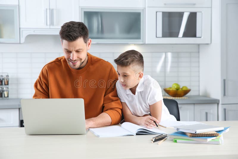 Dad Helping His Son with Homework Stock Image - Image of ideas, male ...