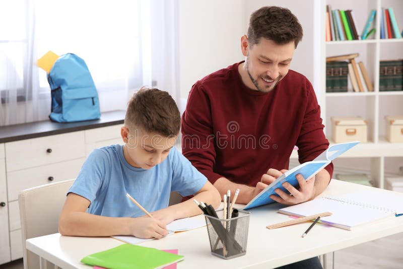 Dad Helping His Son with Homework Stock Photo - Image of exercise ...