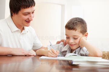 Dad Helping Son Do Homework Stock Photo - Image of white, parents: 28087292