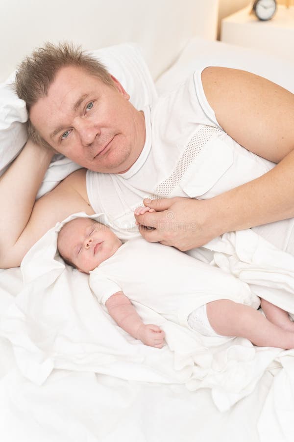 Dad with a newborn baby stock image. Image of portrait - 172237709