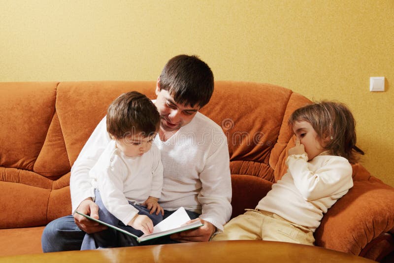 Dad Reading Book To Daughters Stock Image - Image of comfort ...