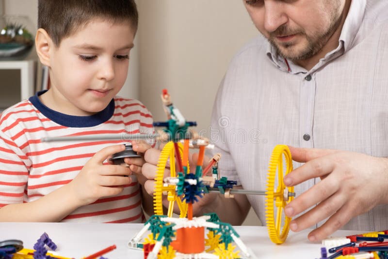 Dad and Son Build Figures from the Constructor. Spending Time Together ...