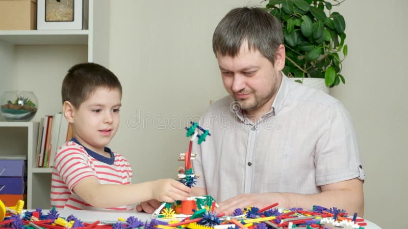 Dad and Son Build Figures from the Constructor. Spending Time Together ...
