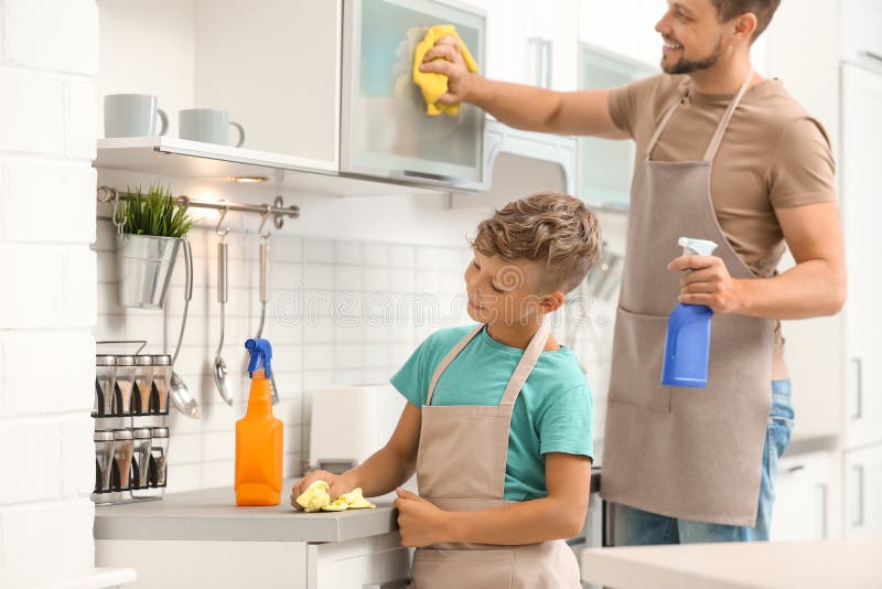 Dad Son Cleaning Kitchen Together Stock Photos - Free & Royalty-Free ...