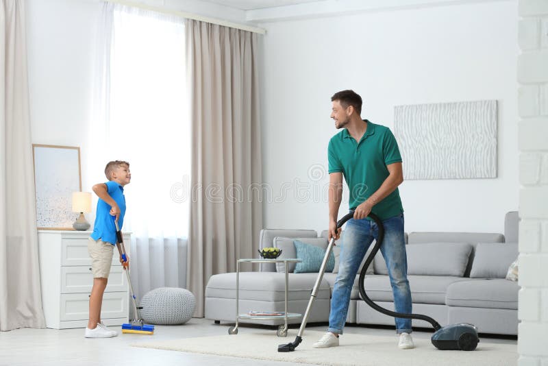 Dad and Son Cleaning Living Room Stock Photo - Image of adult, little ...