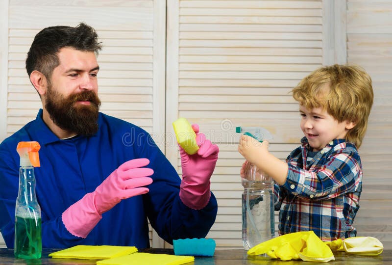 Dad and Son Cleaning Living Room Together. Stock Photo - Image of house ...
