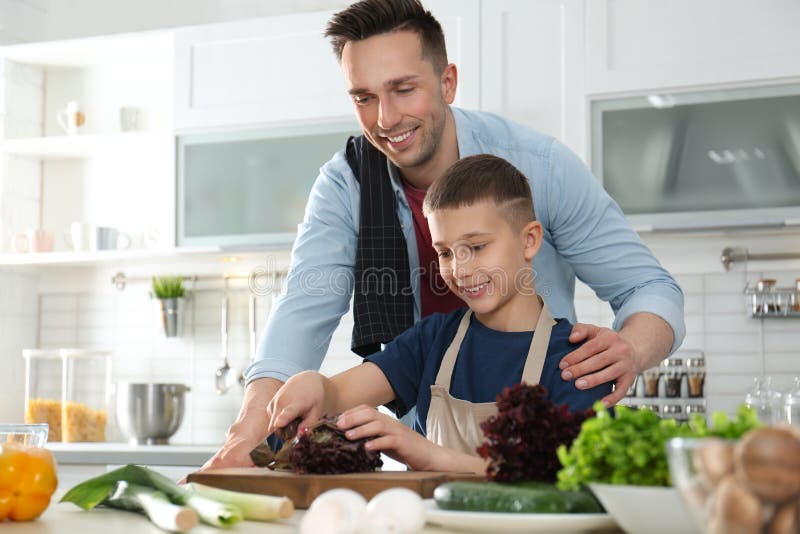 Dad and Son Cooking Together Stock Image - Image of adult, bonding ...