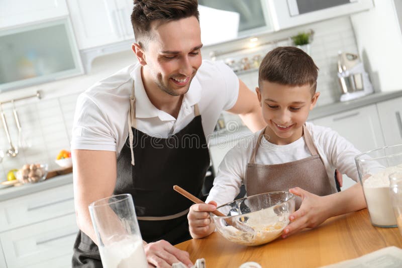 Dad and Son Cooking Together Stock Photo - Image of caucasian, father ...